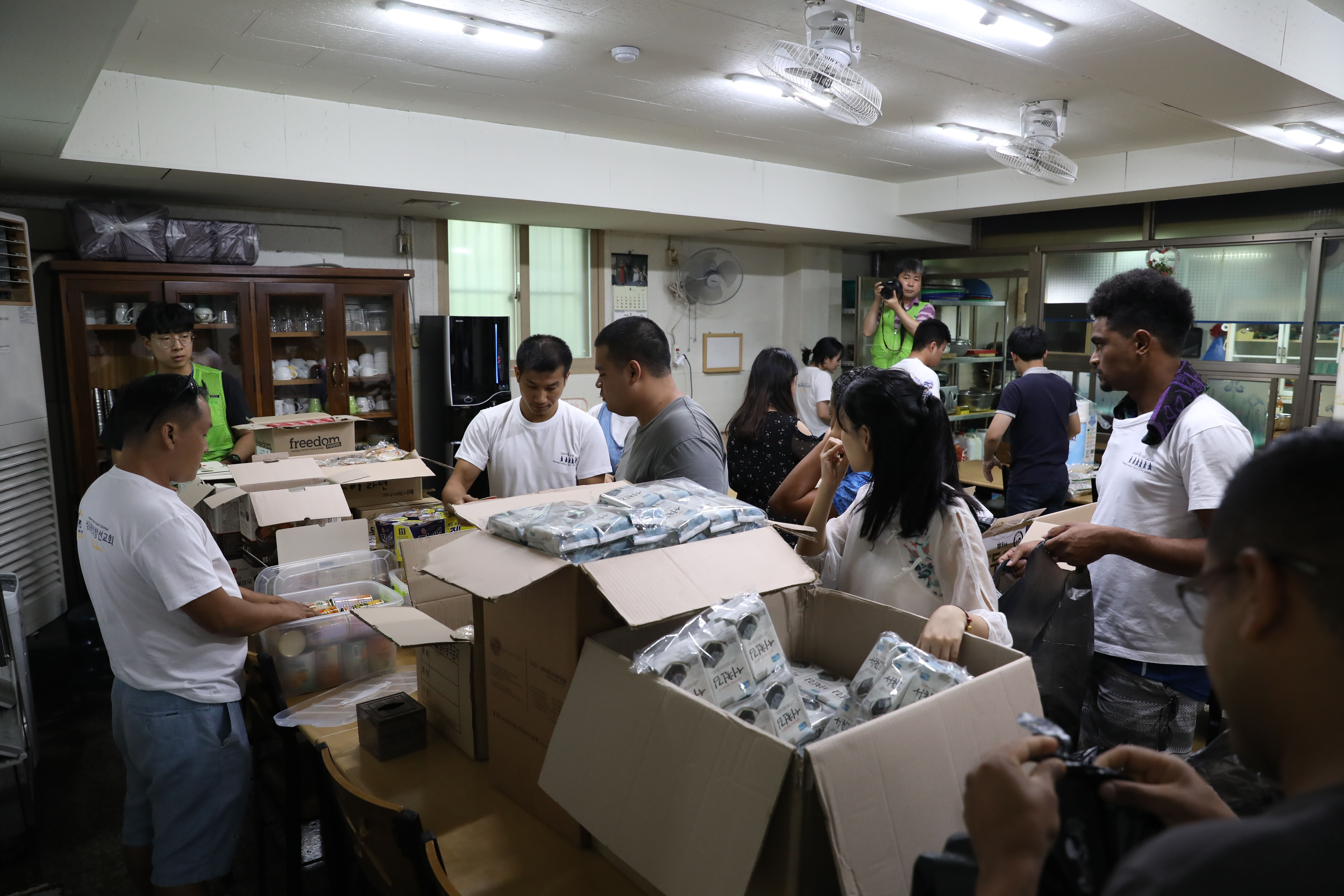 preparing food packages for distribution - Columban Missionaries